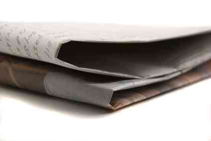 Cómo Escribir una Reseña de la Película para un Periódico